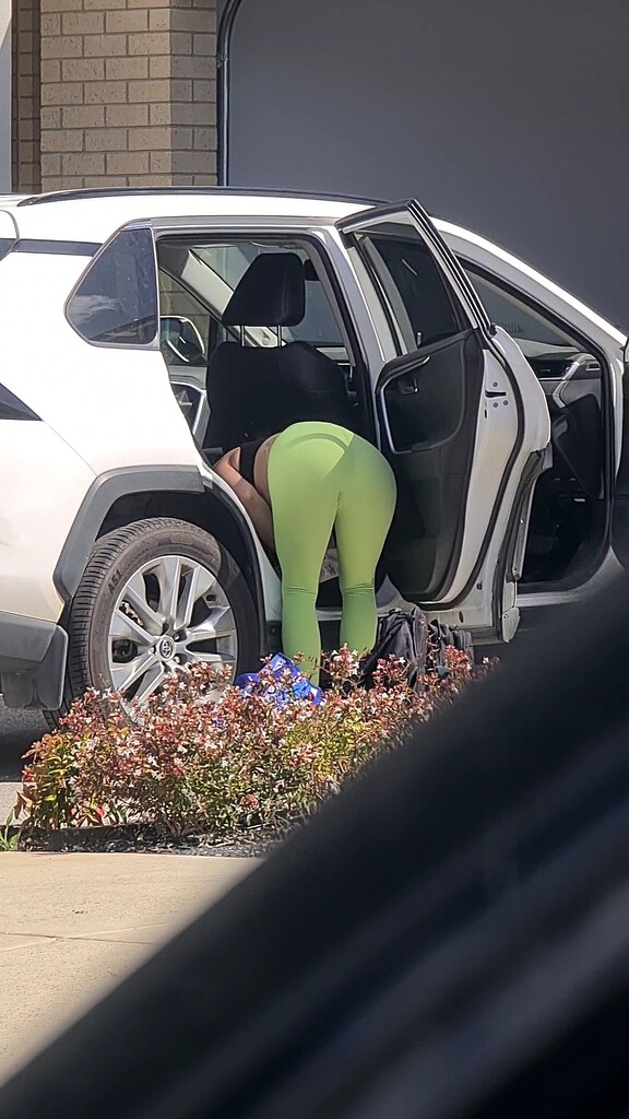 Tight Ass In Fluro Leggings Bending Over To Clean Her Car Spandex