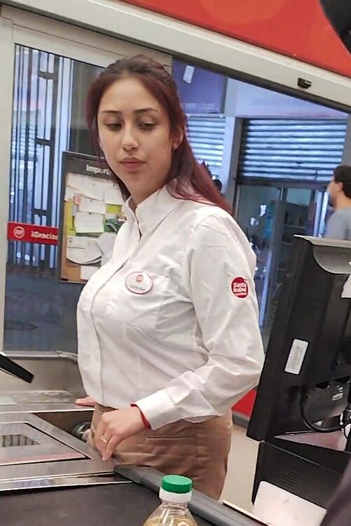 Busty supermarket cashier looks at the camera (OC) - boobs - Forum