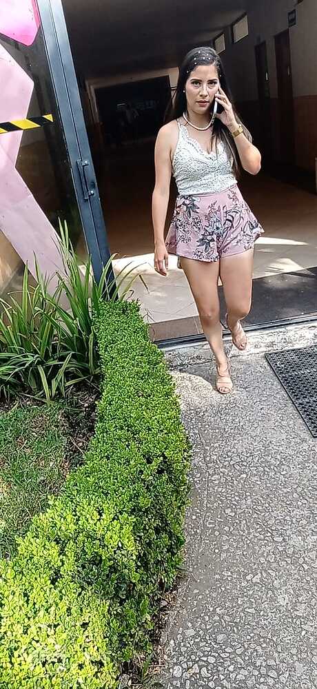 Beautiful latina in pink shorts and high heels - Short Shorts ...