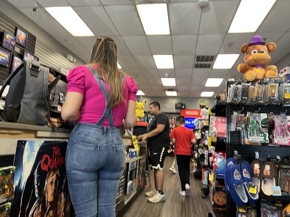Crazy thick milf at GameStop - Tight Jeans - Forum