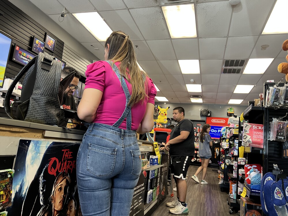 Crazy thick milf at GameStop - Tight Jeans - Forum