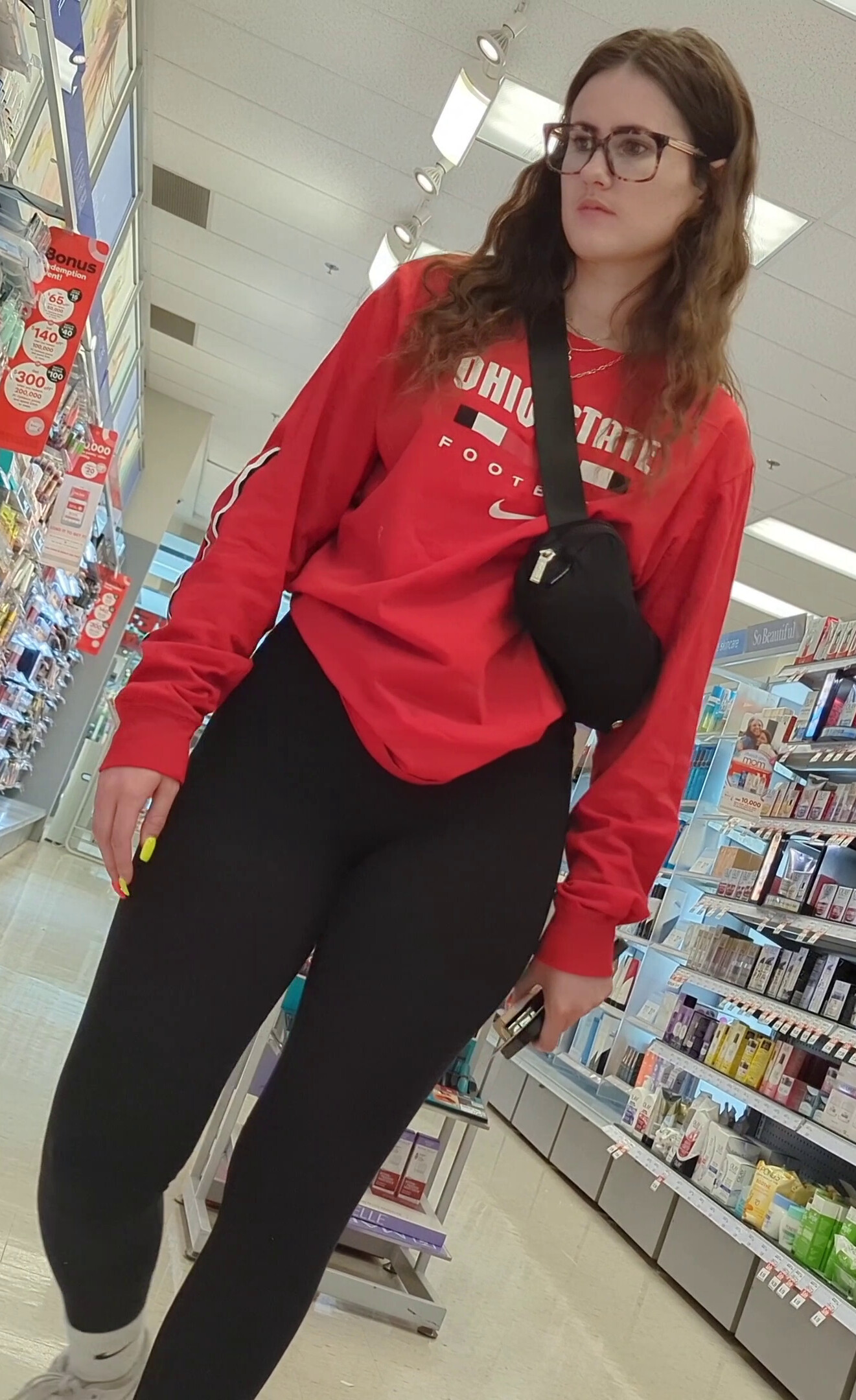 Nerdy Brunette Babe With Friend In The Beauty Section Spandex Leggings Yoga Pants Forum