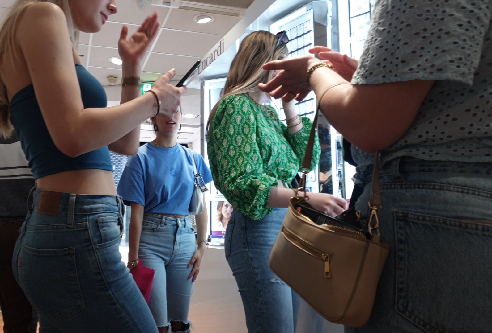 Team jeans! 4 girls with tight asses shopping around in tight jeans ...