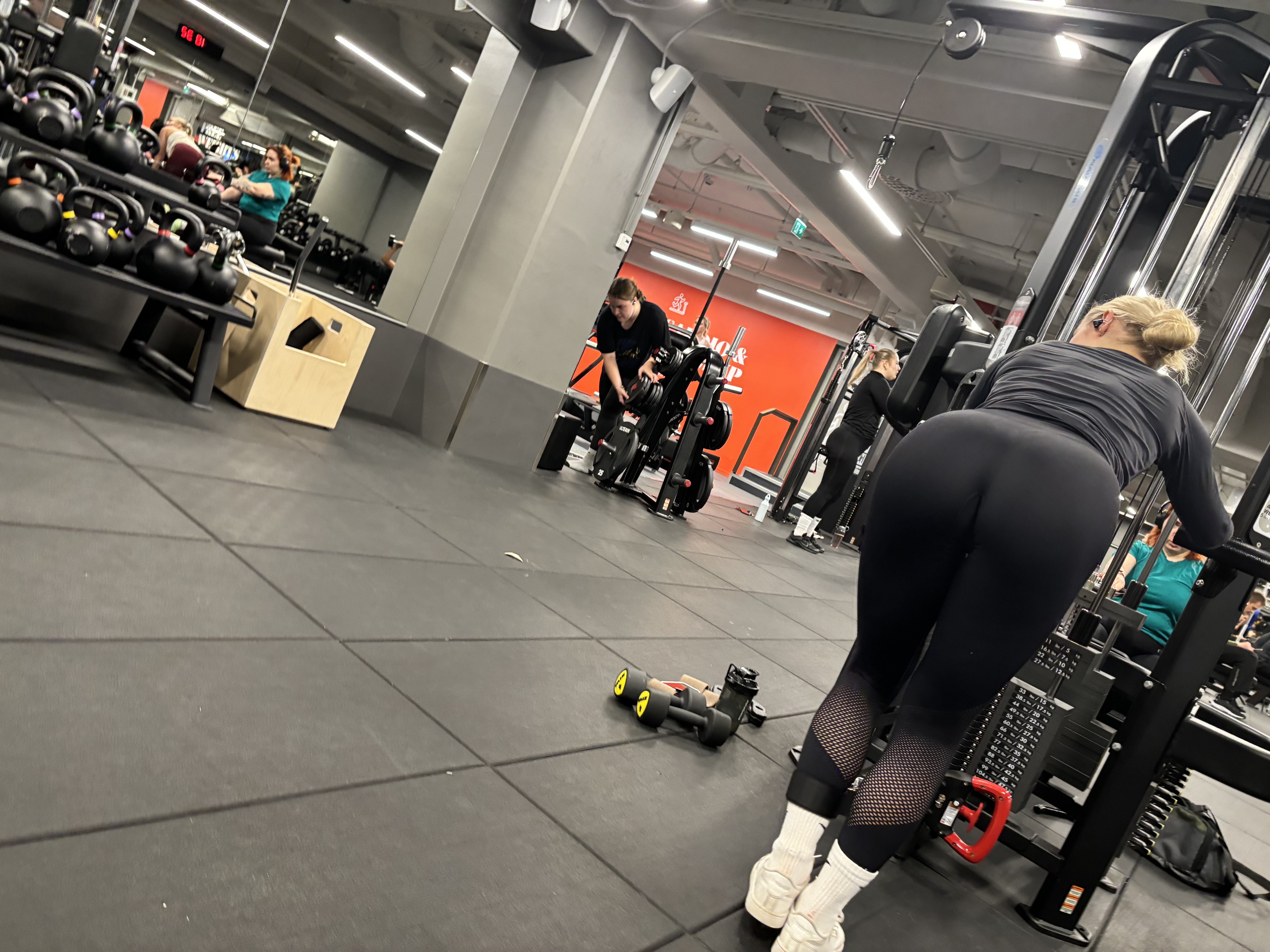 Blonde working out her legs while bending - Spandex, Leggings & Yoga ...