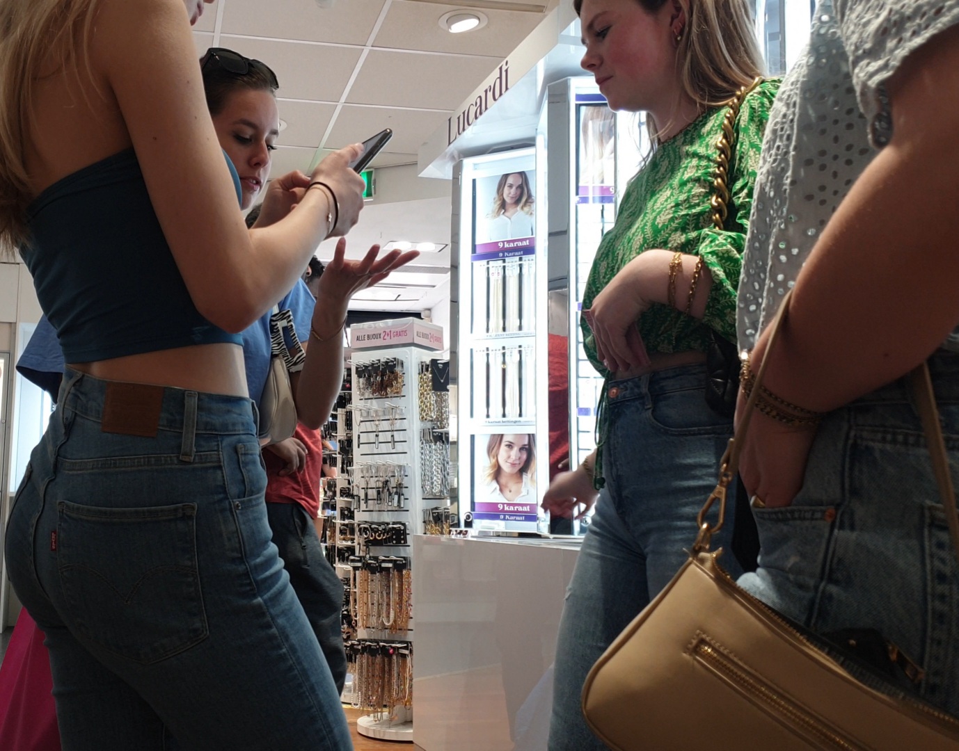 Team jeans! 4 girls with tight asses shopping around in tight jeans ...